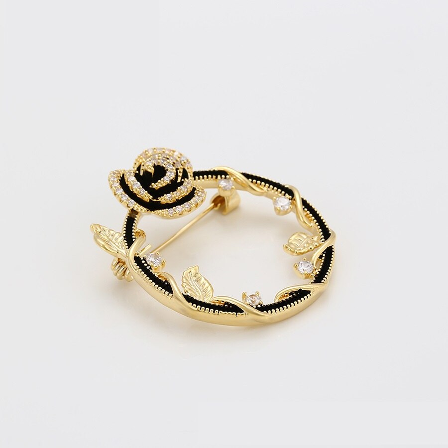 Brosa dublu placata cu aur de 14 K si pietre zirconiu - eMAG.ro