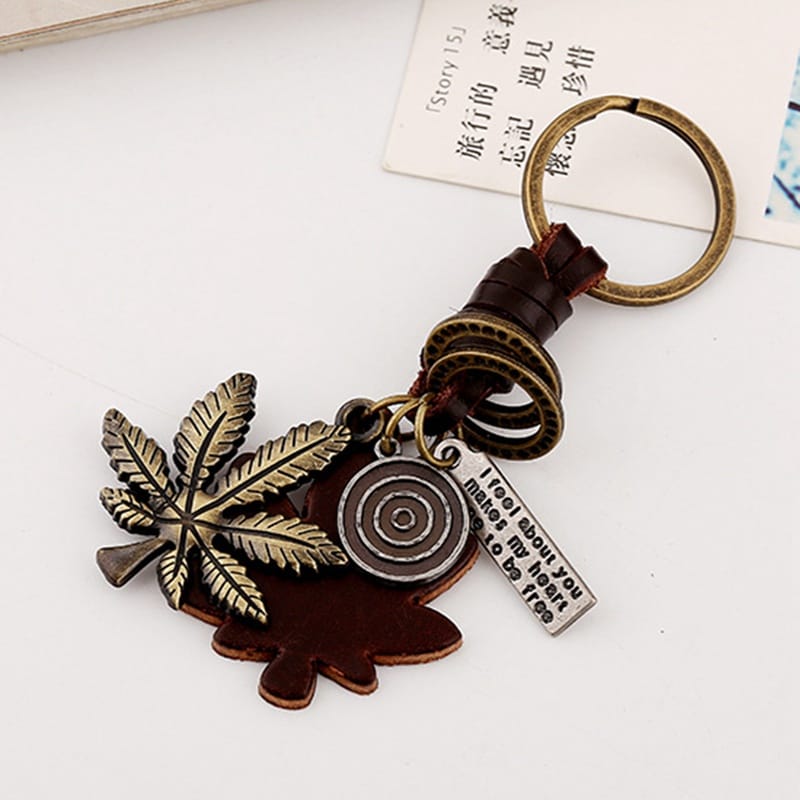 Breloc chei piele si metal, Frunza - eMAG.ro