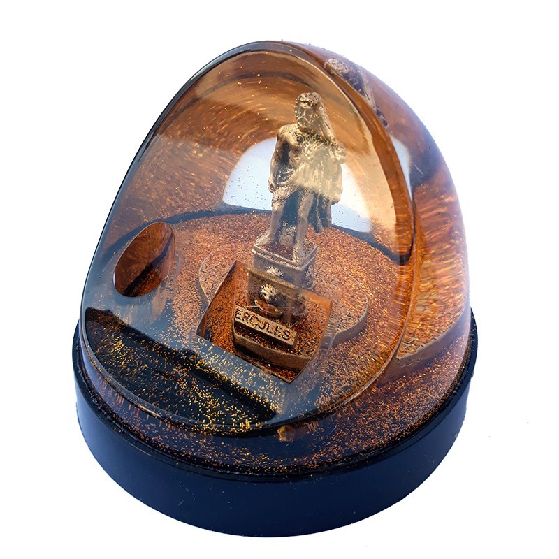 Glob din plastic cu lichid si sclipici, in interior avand o statueta ...