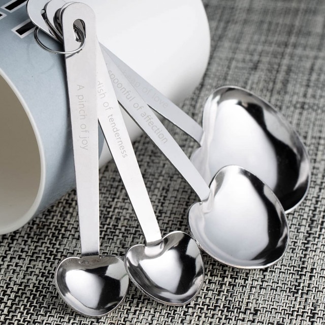 Set 4 linguri de dimensiuni diferite din metal pentru masurat ...