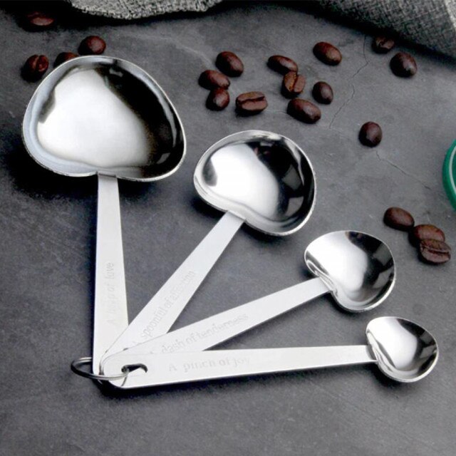 Set 4 linguri de dimensiuni diferite din metal pentru masurat ...