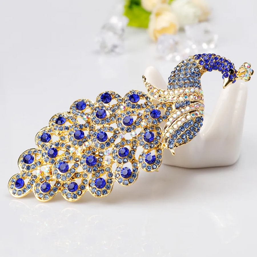 Brosa eleganta model paun cu cristale albastre - eMAG.ro