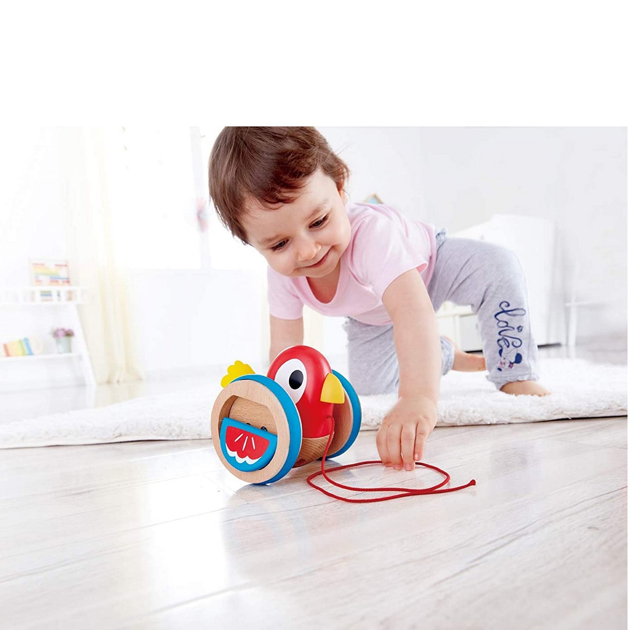 Jucarie de tras Hape - Pui de pasare - eMAG.ro