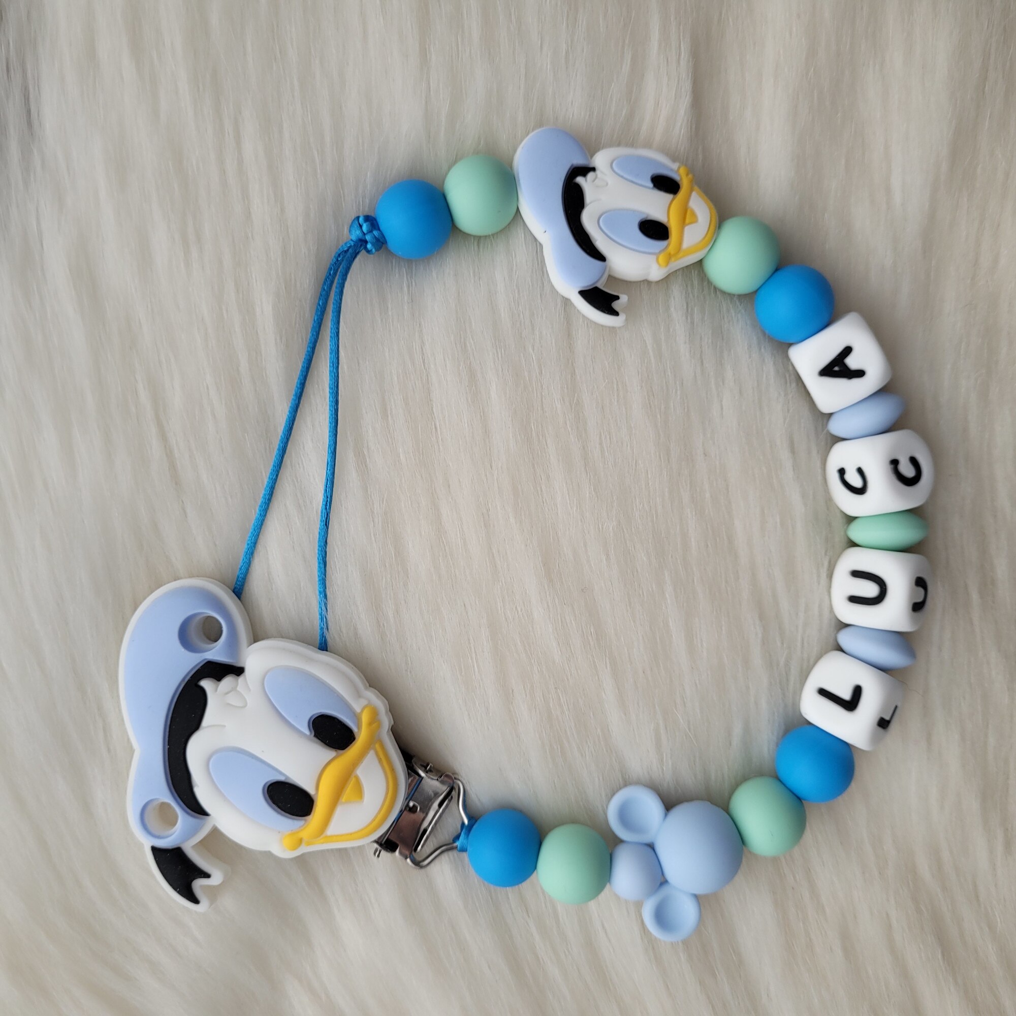 Lantisor pentru suzeta din silicon alimentar, Donald Bleu - eMAG.ro