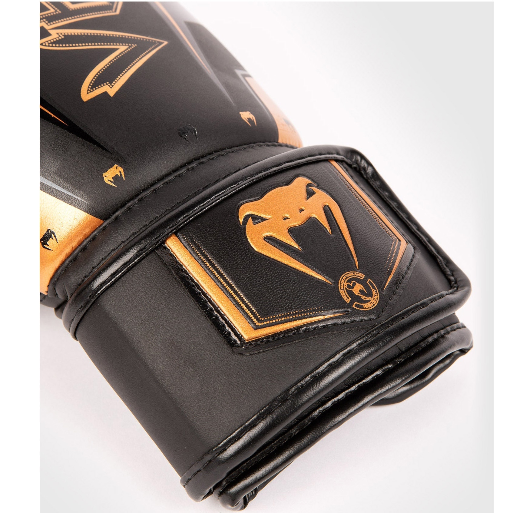 Manusi box VENUM Elite Evo pentru adulti, 8 oz, negru/bronz - eMAG.ro