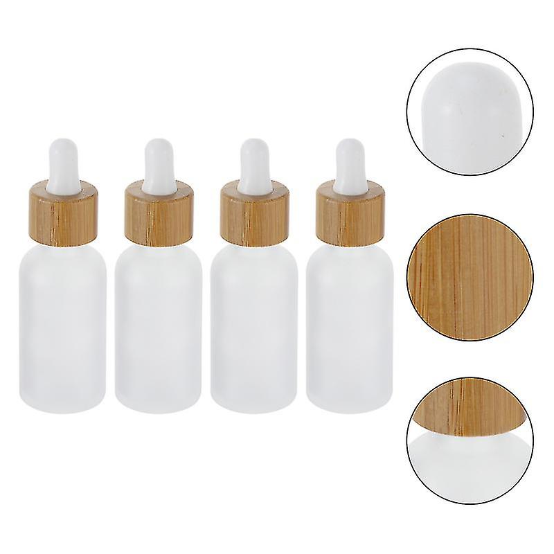 Set de 4 flacoane din sticla transparenta de 30 ml si picaturi, goluri ...