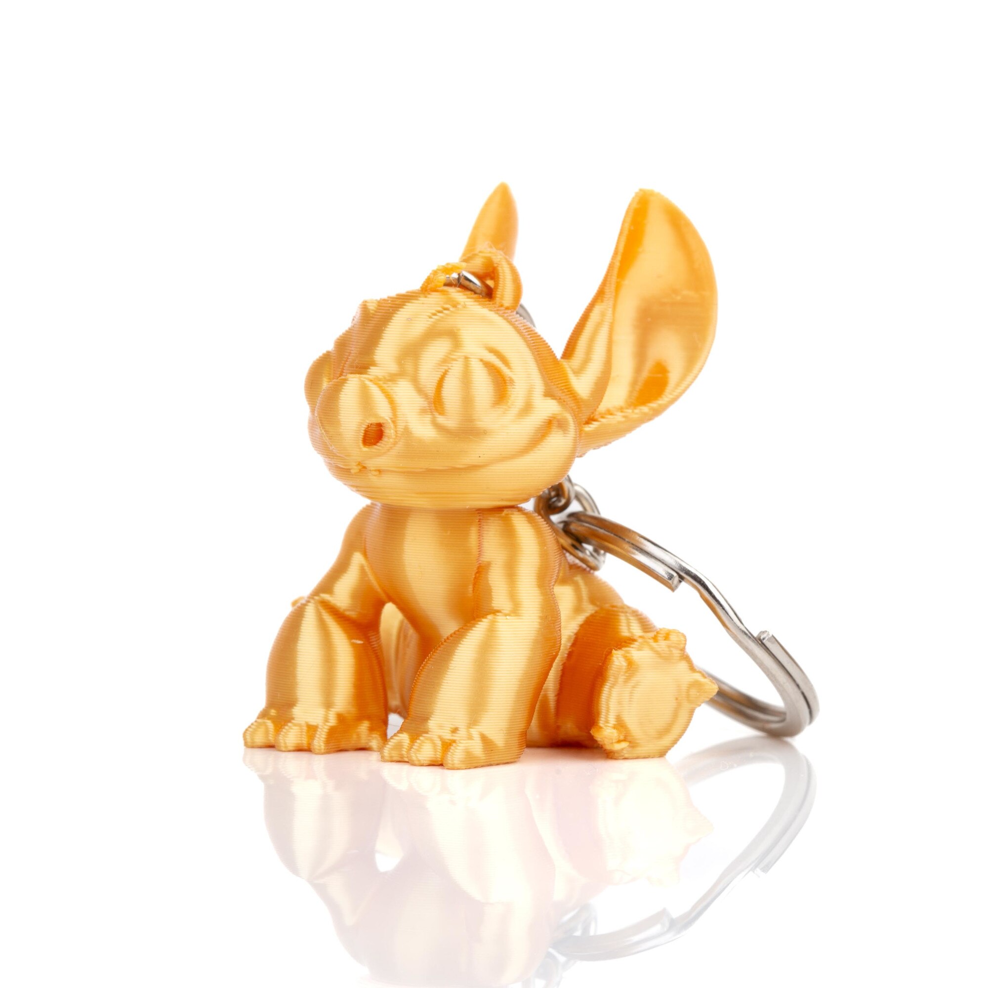 Breloc Stitch de la Disney, Auriu - eMAG.ro
