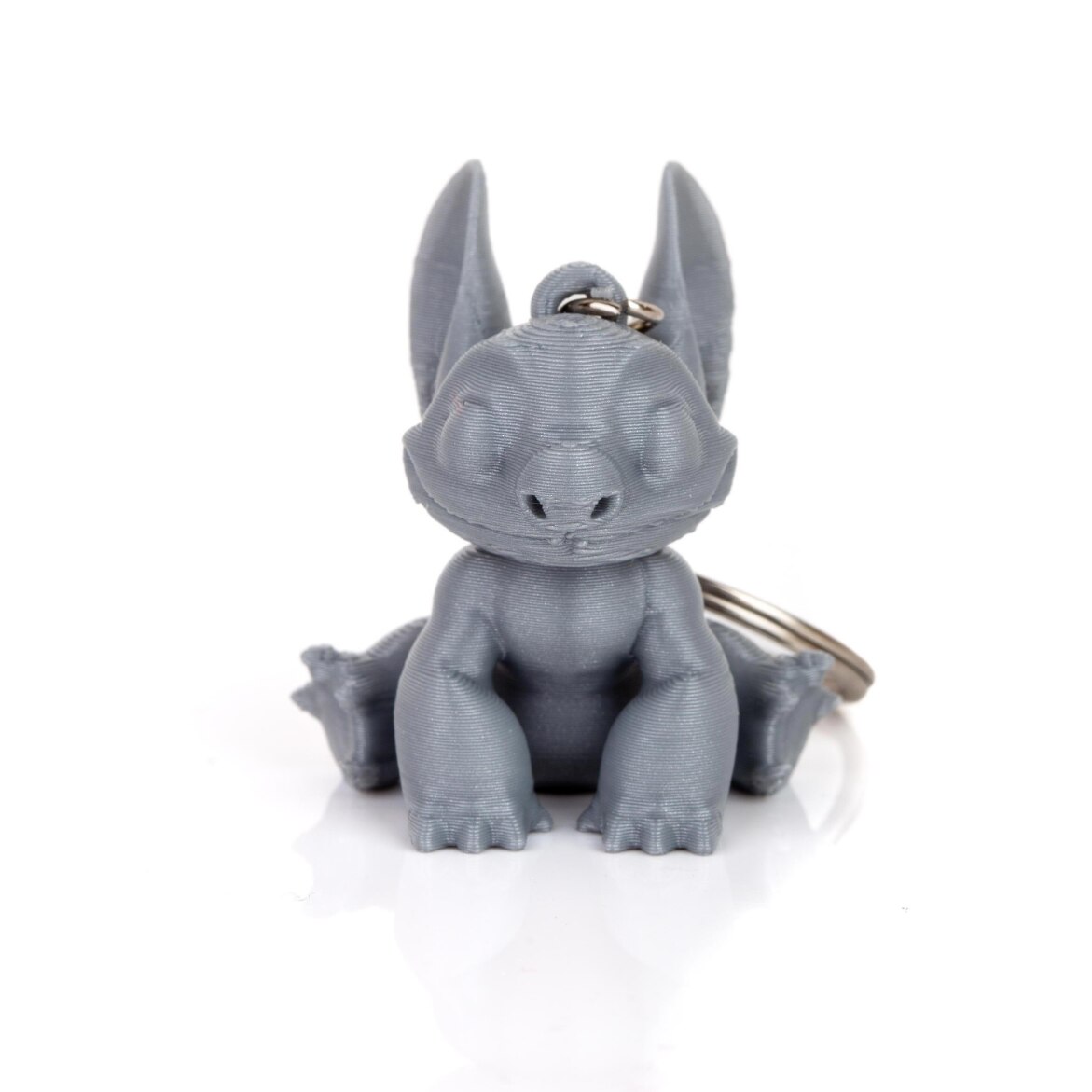 Breloc Stitch de la Disney, Mov metalizat - eMAG.ro
