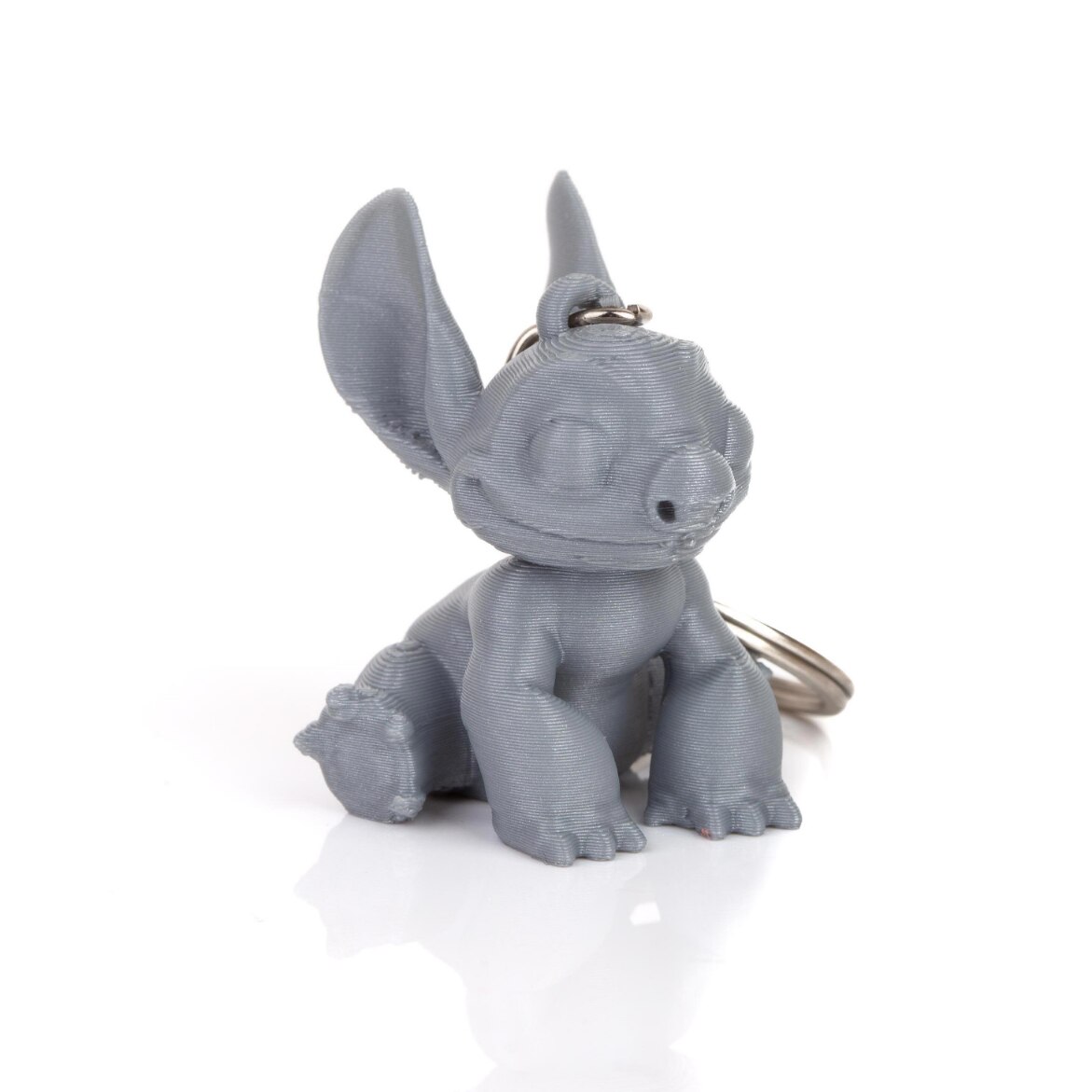 Breloc Stitch de la Disney, Mov metalizat - eMAG.ro