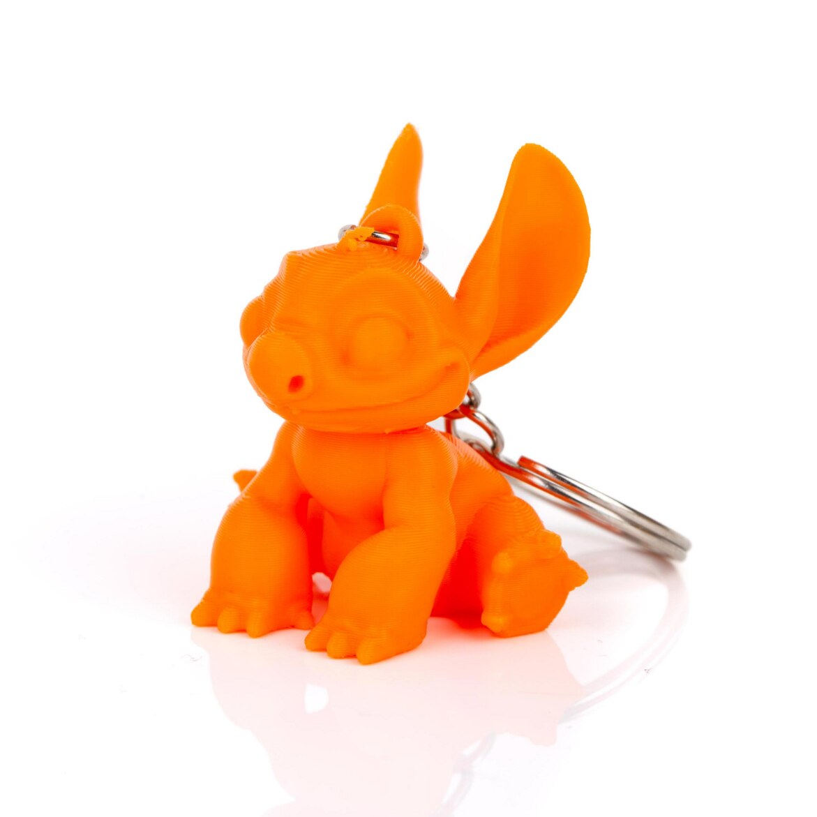 Breloc Stitch de la Disney Orange - eMAG.ro