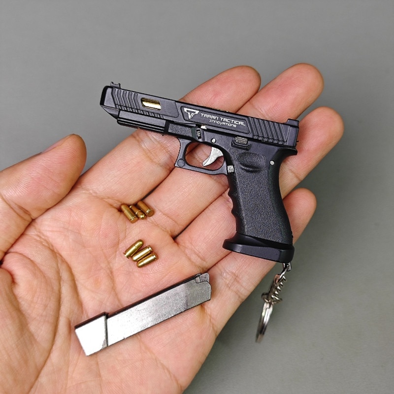 Breloc mini pistol G34, set cu 5 gloante si cutie plastic，metal, 7x3 ...